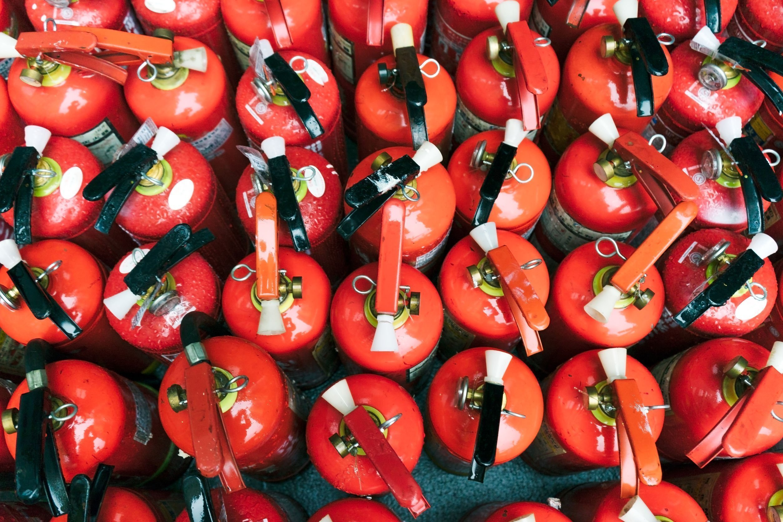 51151762 - many red fire extinguishers - Herfer